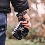 How to Carry a Camera Without a Bag: The Ultimate Guide